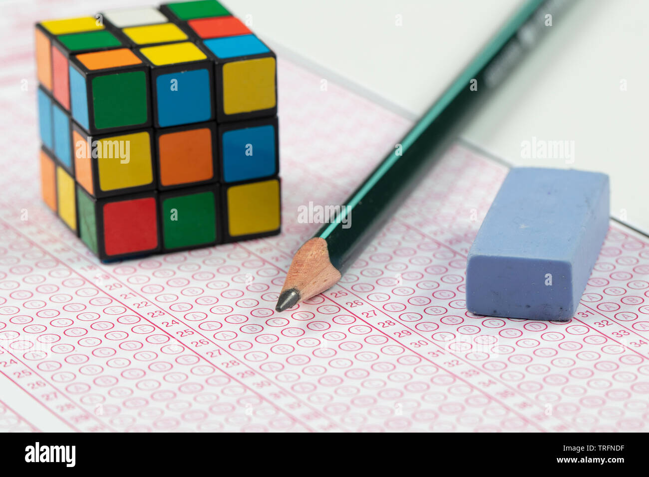 School Students hands taking exams, writing examination holding pencil ...