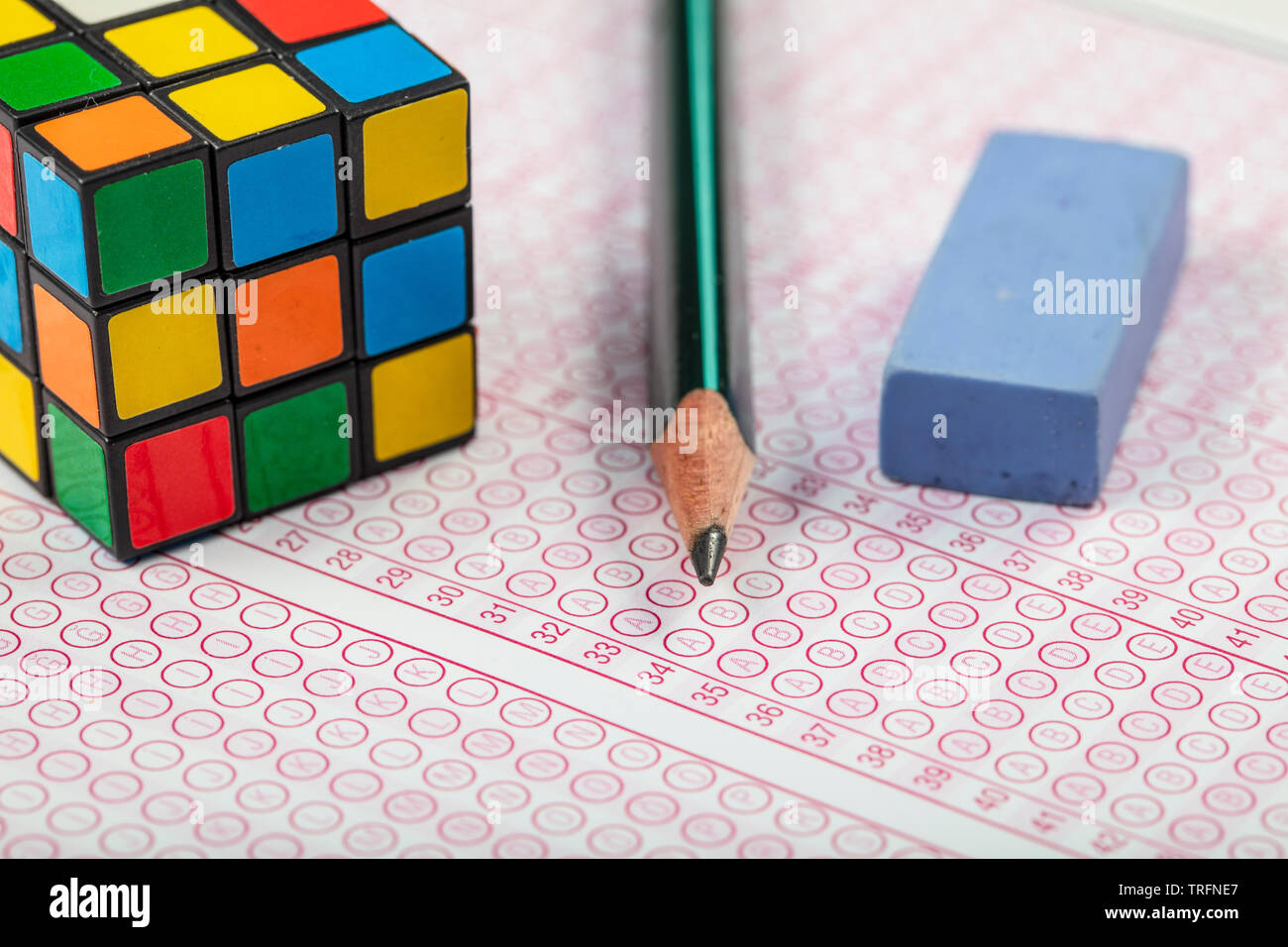 School Students hands taking exams, writing examination holding pencil ...