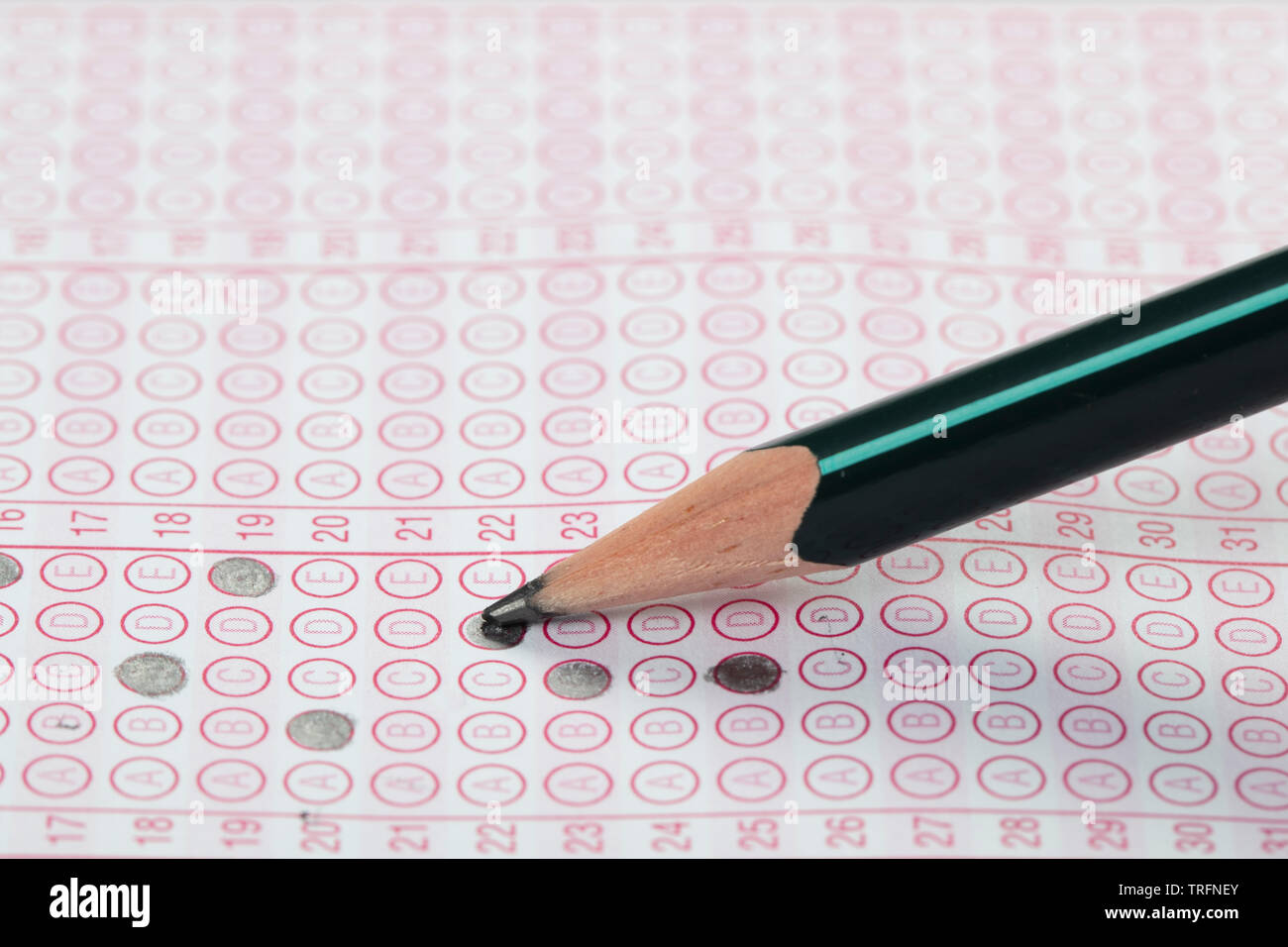 School Students hands taking exams, writing examination holding pencil ...