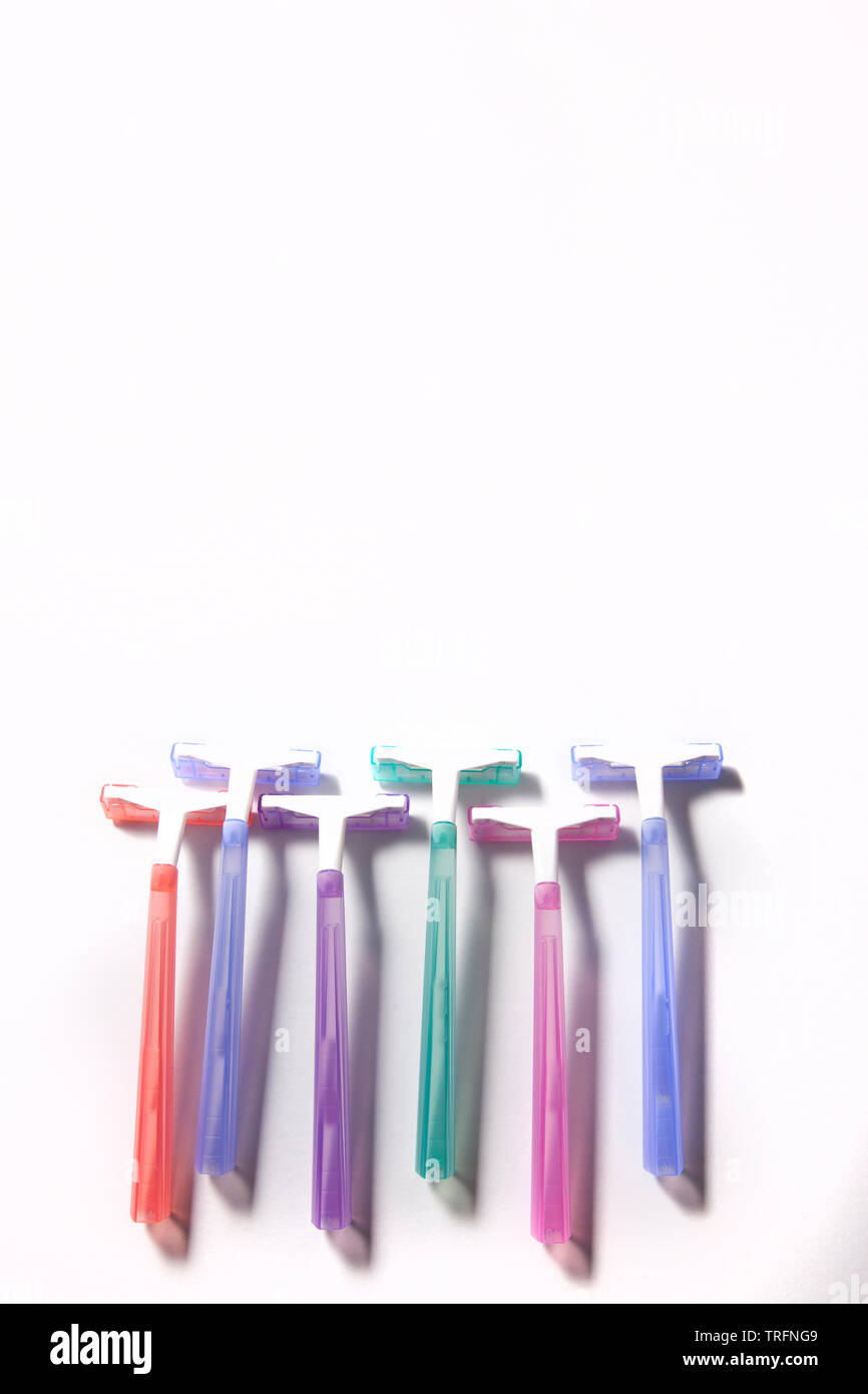 Vertical set of pastel colored razors or shaving equipment Stock Photo ...
