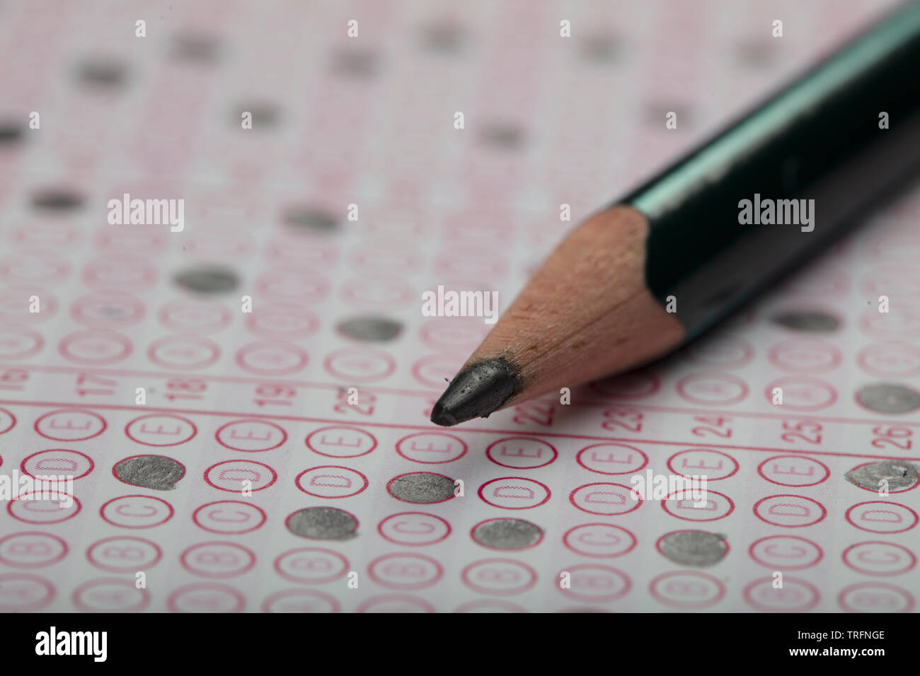 School Students hands taking exams, writing examination holding pencil ...
