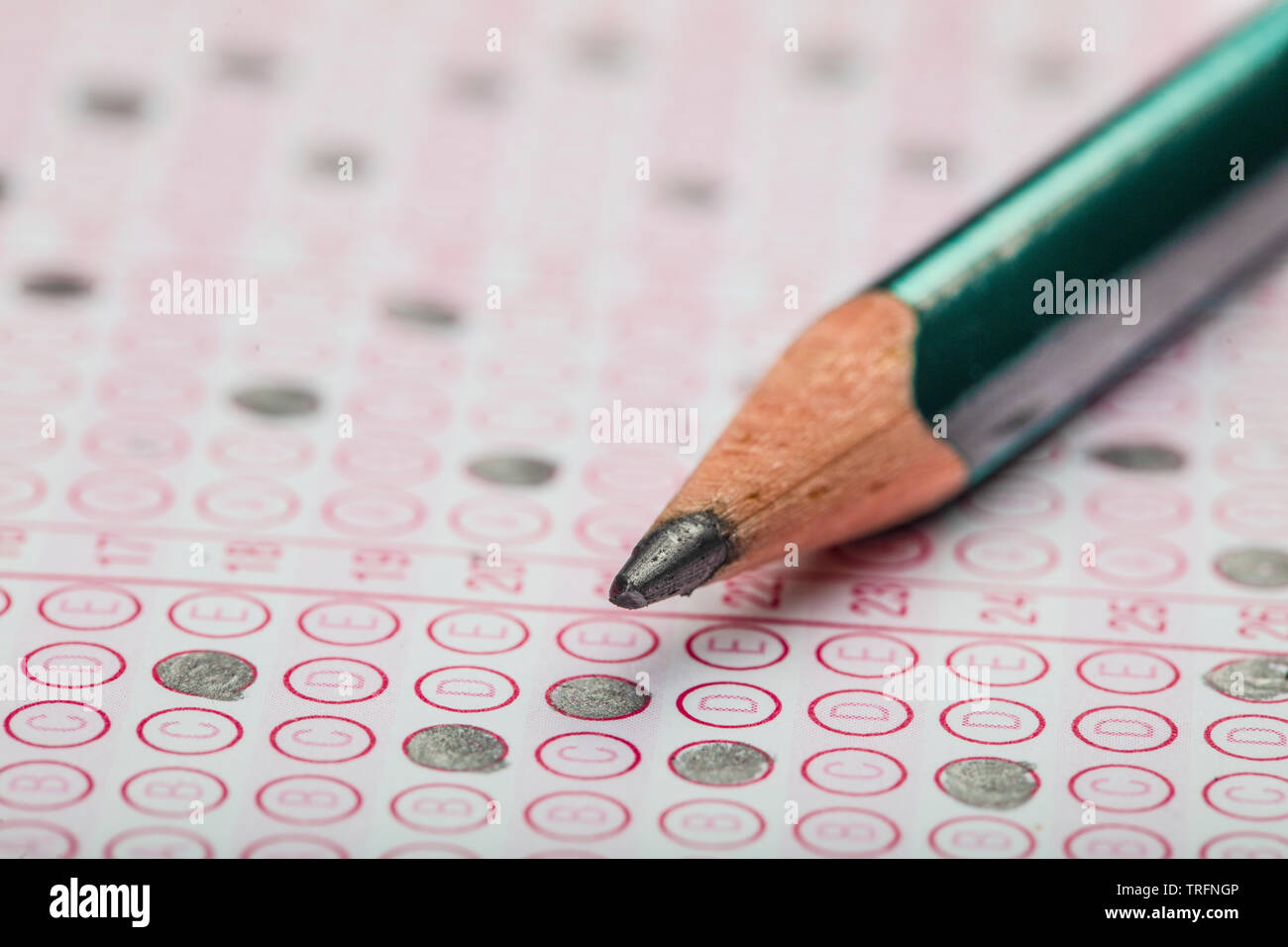 School Students hands taking exams, writing examination holding pencil ...