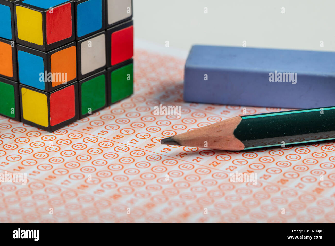 School Students hands taking exams, writing examination holding pencil ...