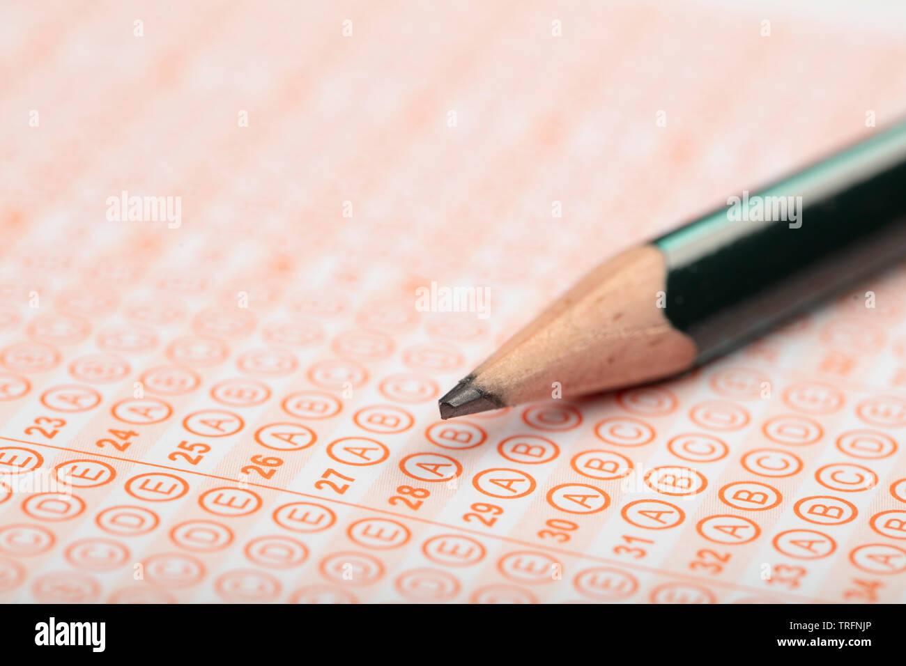School Students hands taking exams, writing examination holding pencil ...