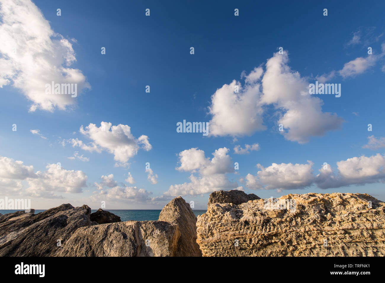 Granite rocks and ocean water in a Cancun beach, Mexico Stock Photo - Alamy