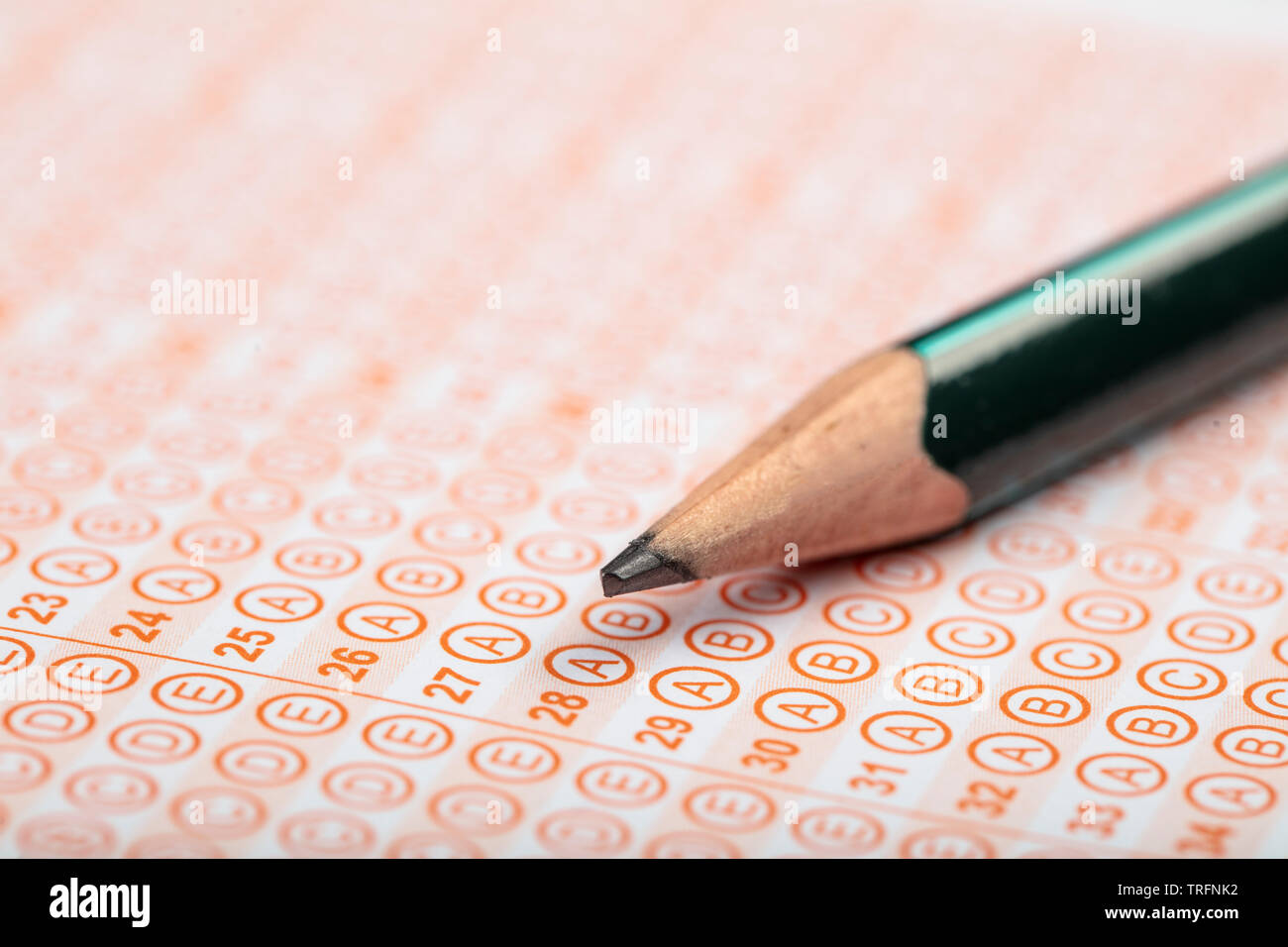 School Students hands taking exams, writing examination holding pencil ...