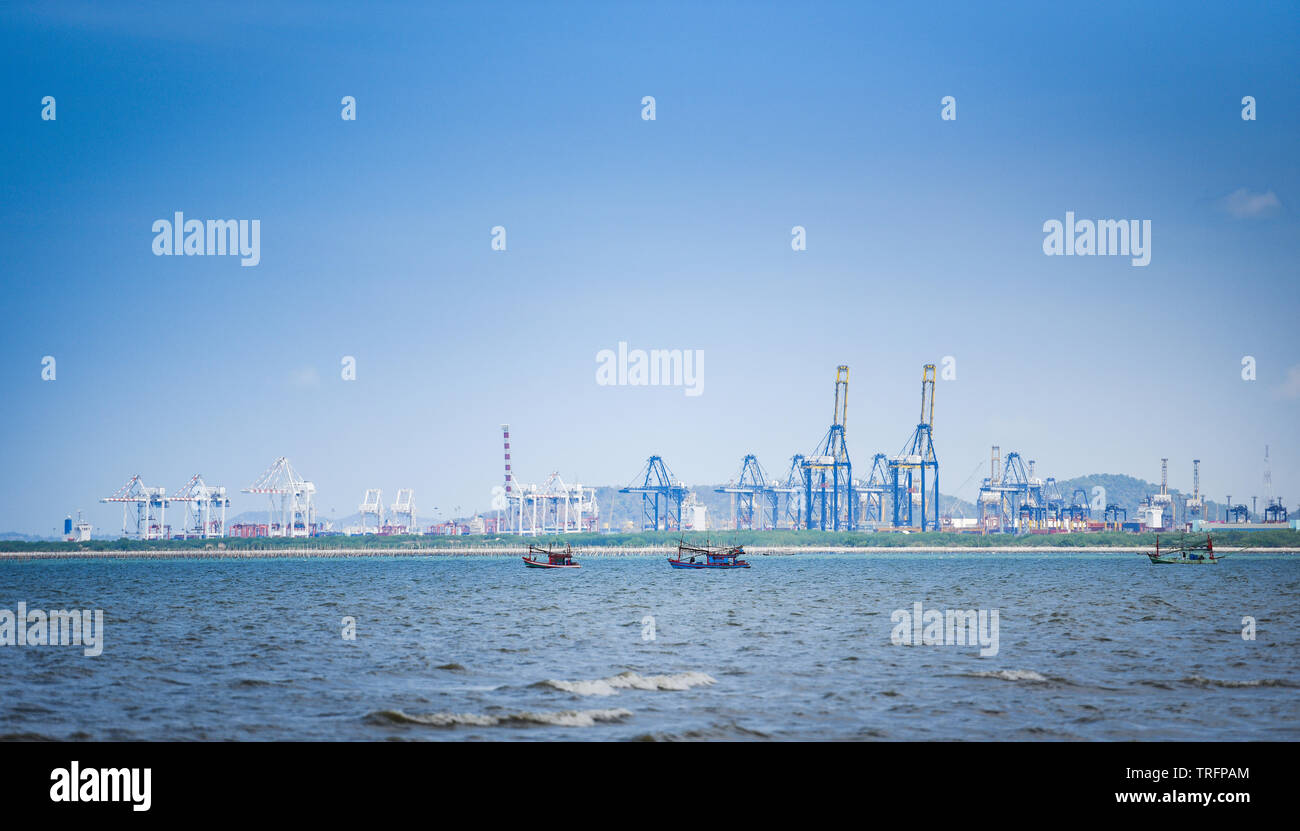 Shipping cargo crane and container ship in export and import business ...