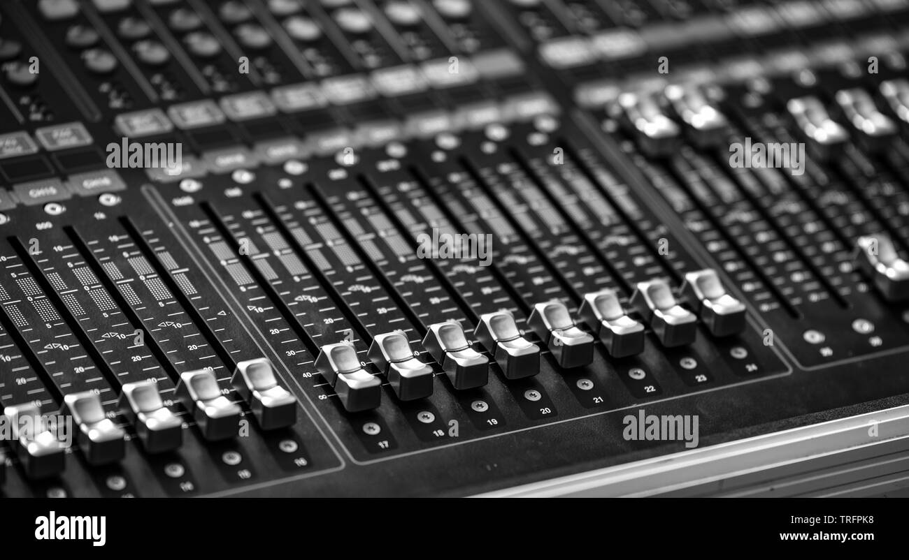 Professional audio mix sound control panel console / Sound technician ...