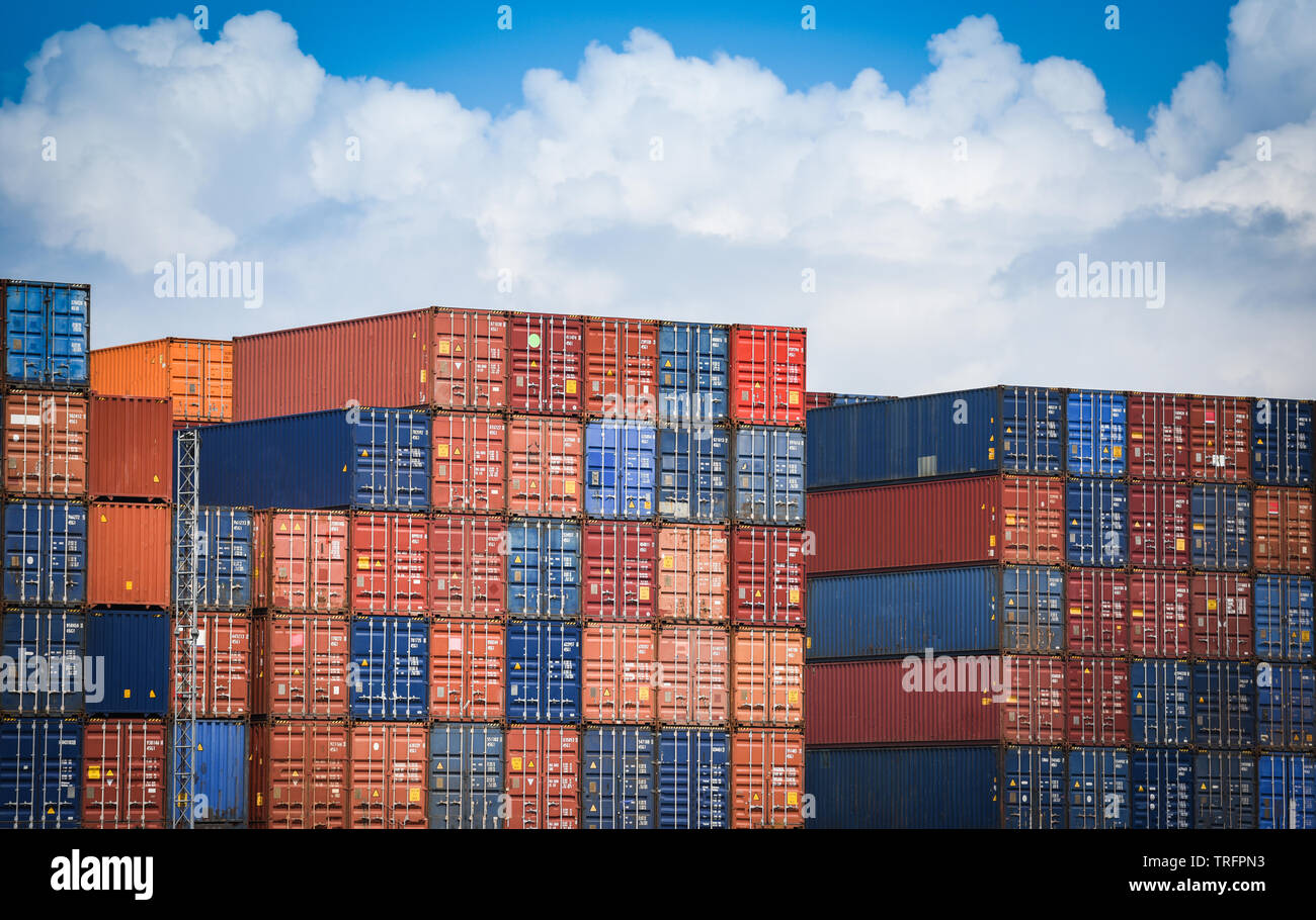 Container ship in export and import business and logistics in harbor ...