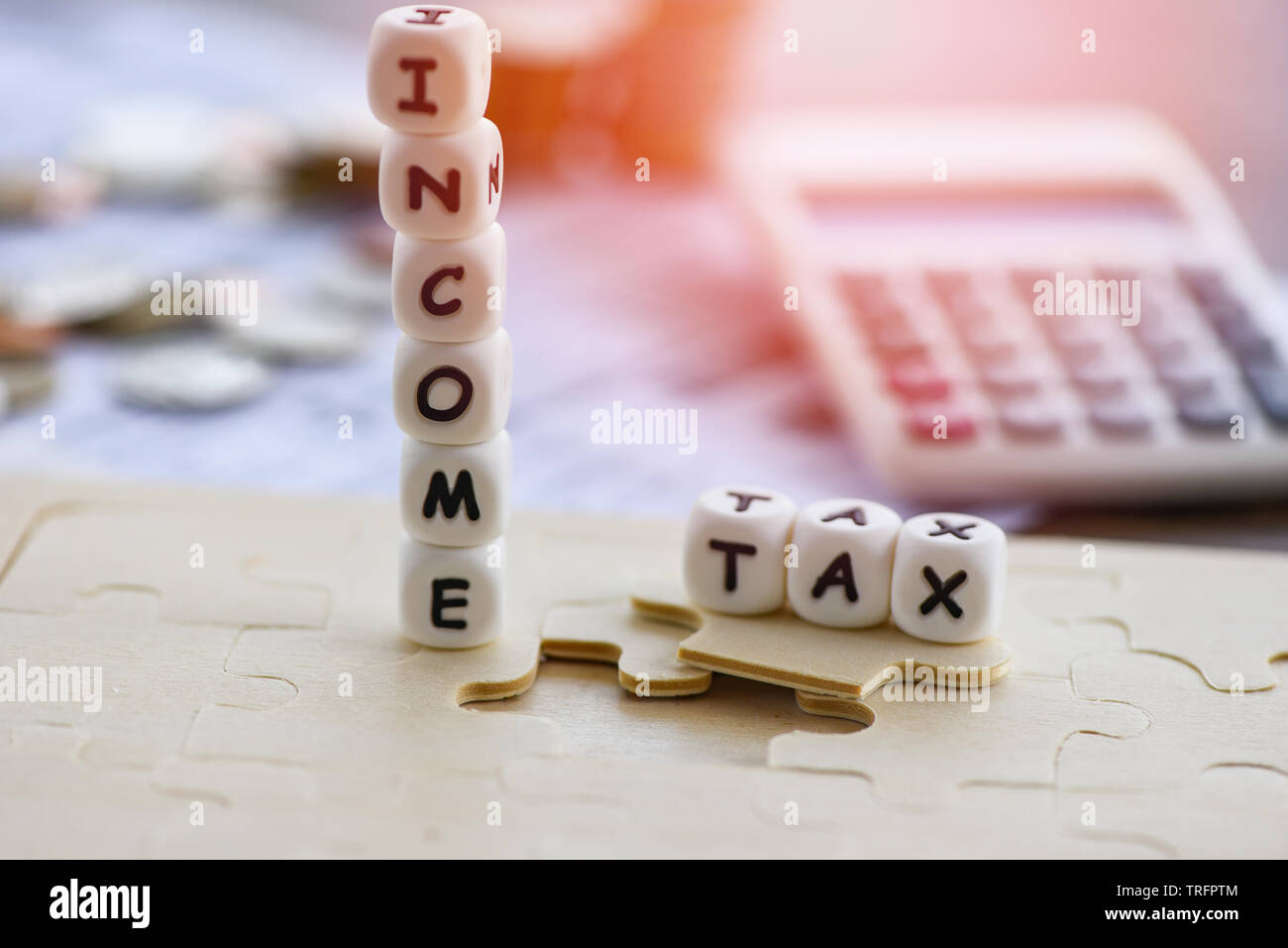 Income Tax Return Deduction Refund Concep / Tax words on jigsaw and ...