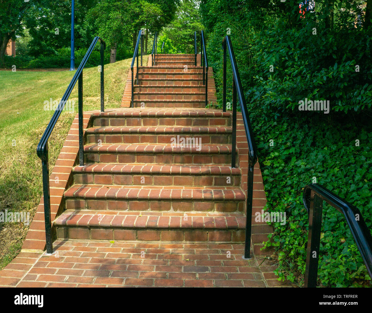 Brick steps and iron railing hi-res stock photography and images - Alamy