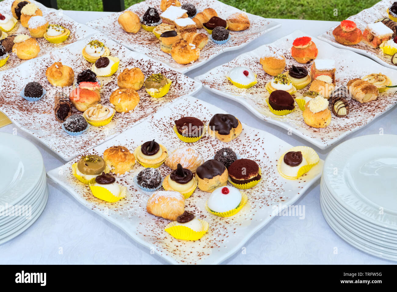 Assorted mini cakes different cream hi-res stock photography and images ...