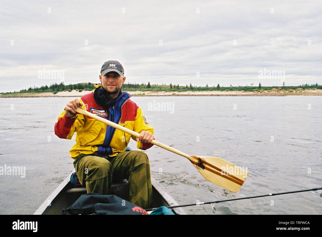 The Norwegian outdoor photographer Øyvind Martinsen in the canoe on ...