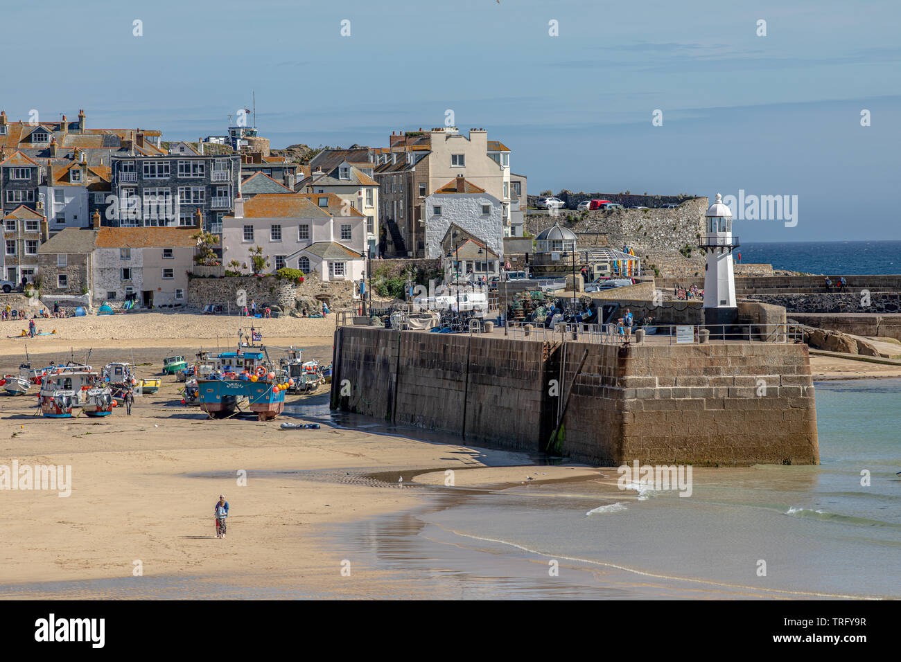 St Ives seaside town in Cornwall, England with seal wall, harbour, town ...