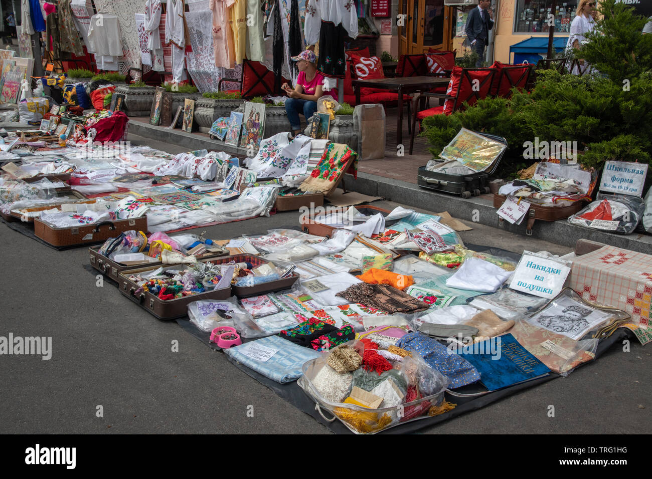 objects for sale on the ground at a flea market Andreasviertel, Kiev ...