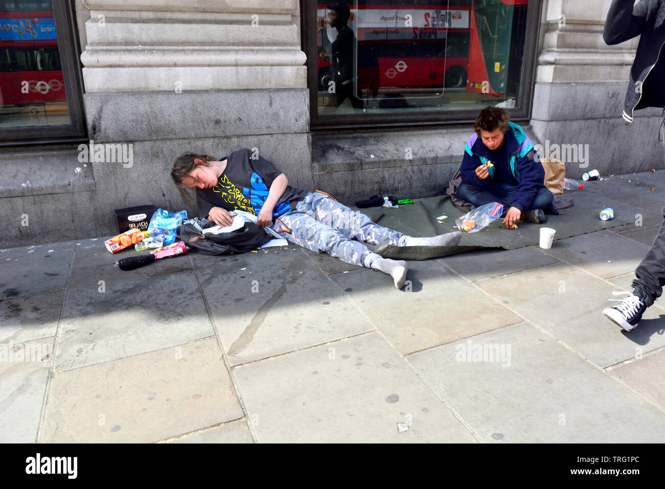 London, England, UK. Homeless men on the street in the Strand Stock ...