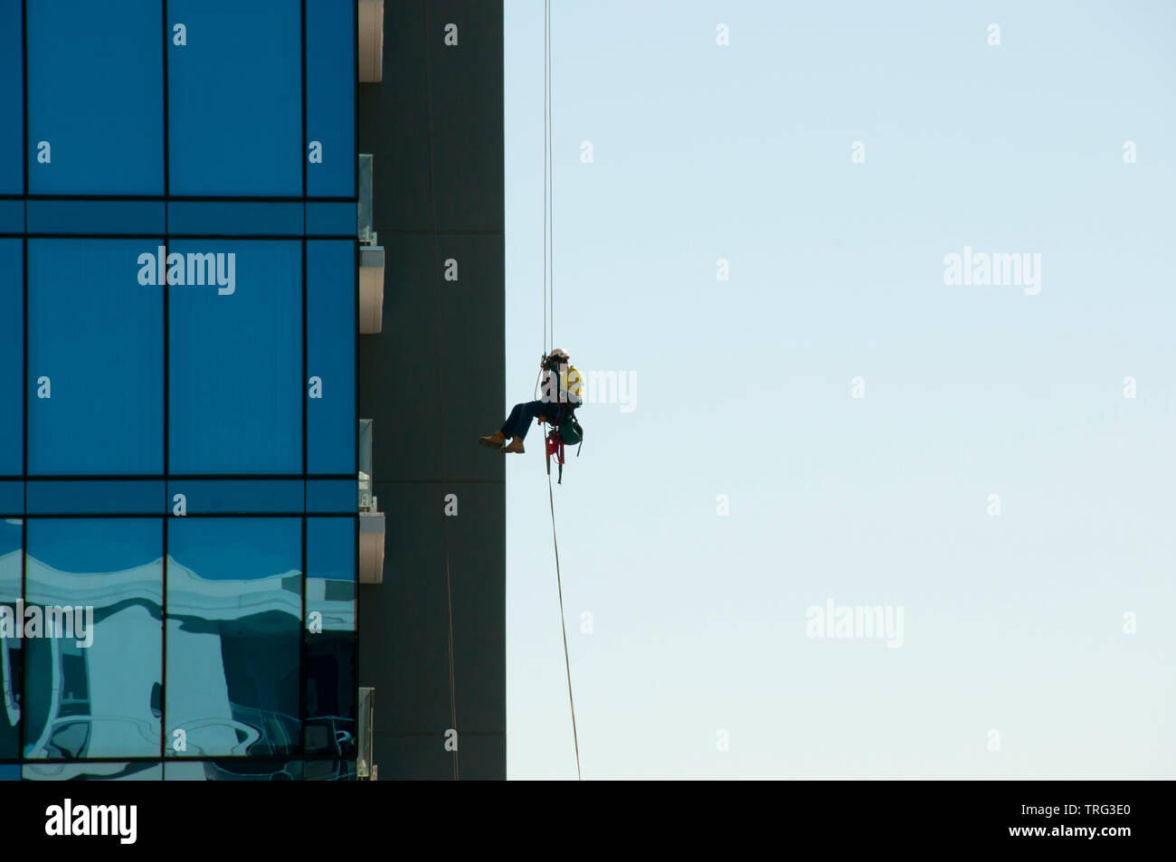 Windows Cleaning on City Building Stock Photo - Alamy