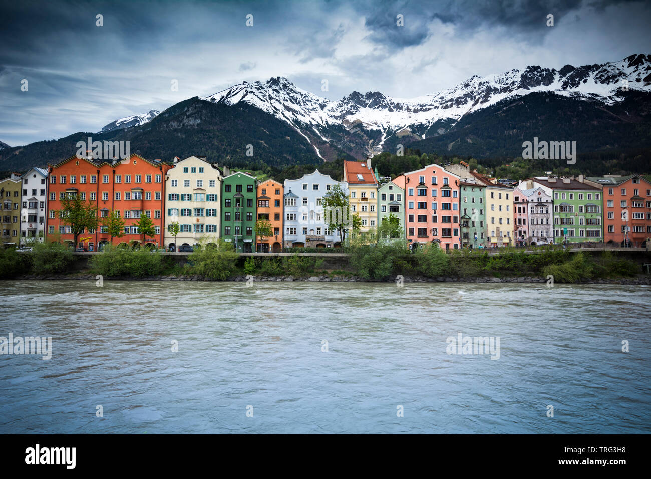 Innsbruck waterfront with Alpine backdrop in Austria Stock Photo - Alamy