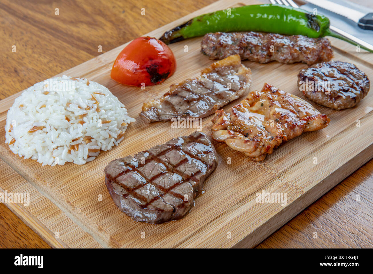 Mixed grilled meat platter. The mixed grill; meatballs, chicken, steak ...