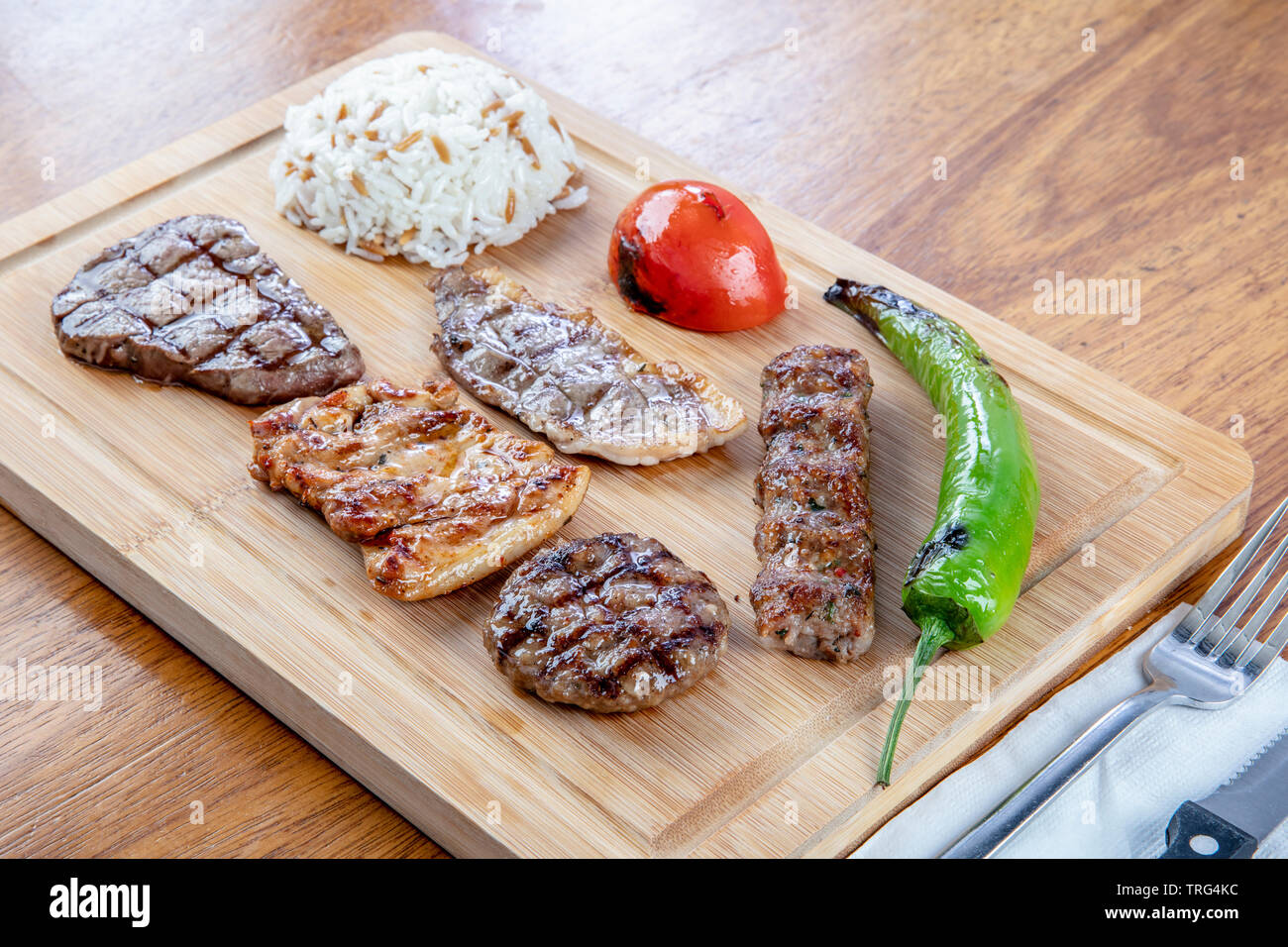 Mixed grilled meat platter. The mixed grill; meatballs, chicken, steak ...