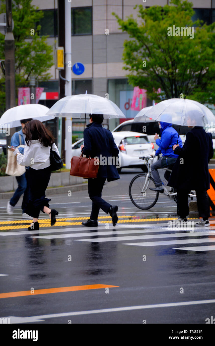 Walking in the rain hi-res stock photography and images - Alamy
