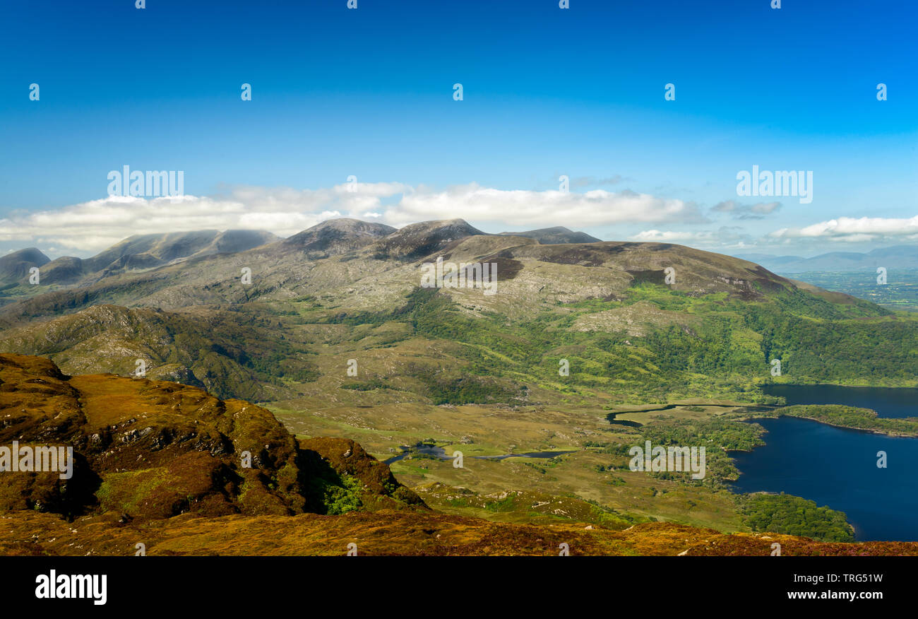 Panoramic view to Carrauntoohil and the Macgillycuddy's Reeks as seen ...