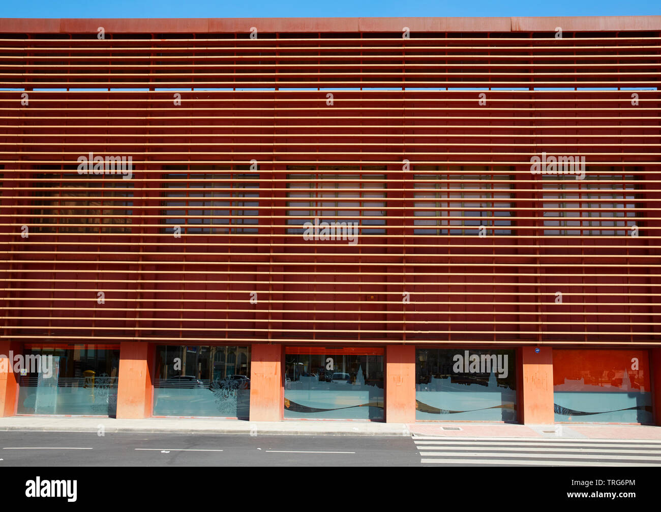 Facade of the red modern terminal to Toledo bus station in Spain Stock ...