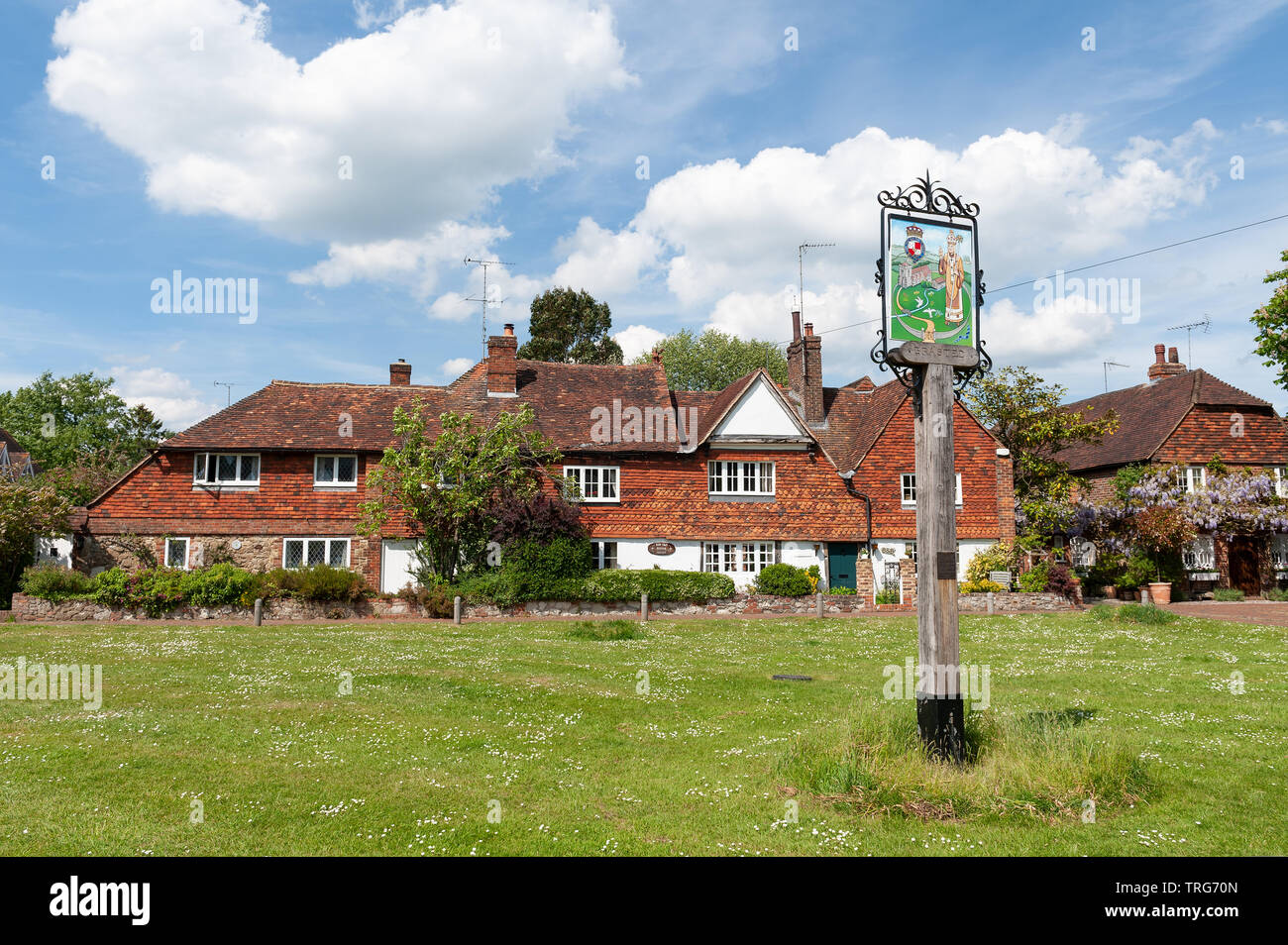Brasted Village Green and an old oak sign post in the center of the ...