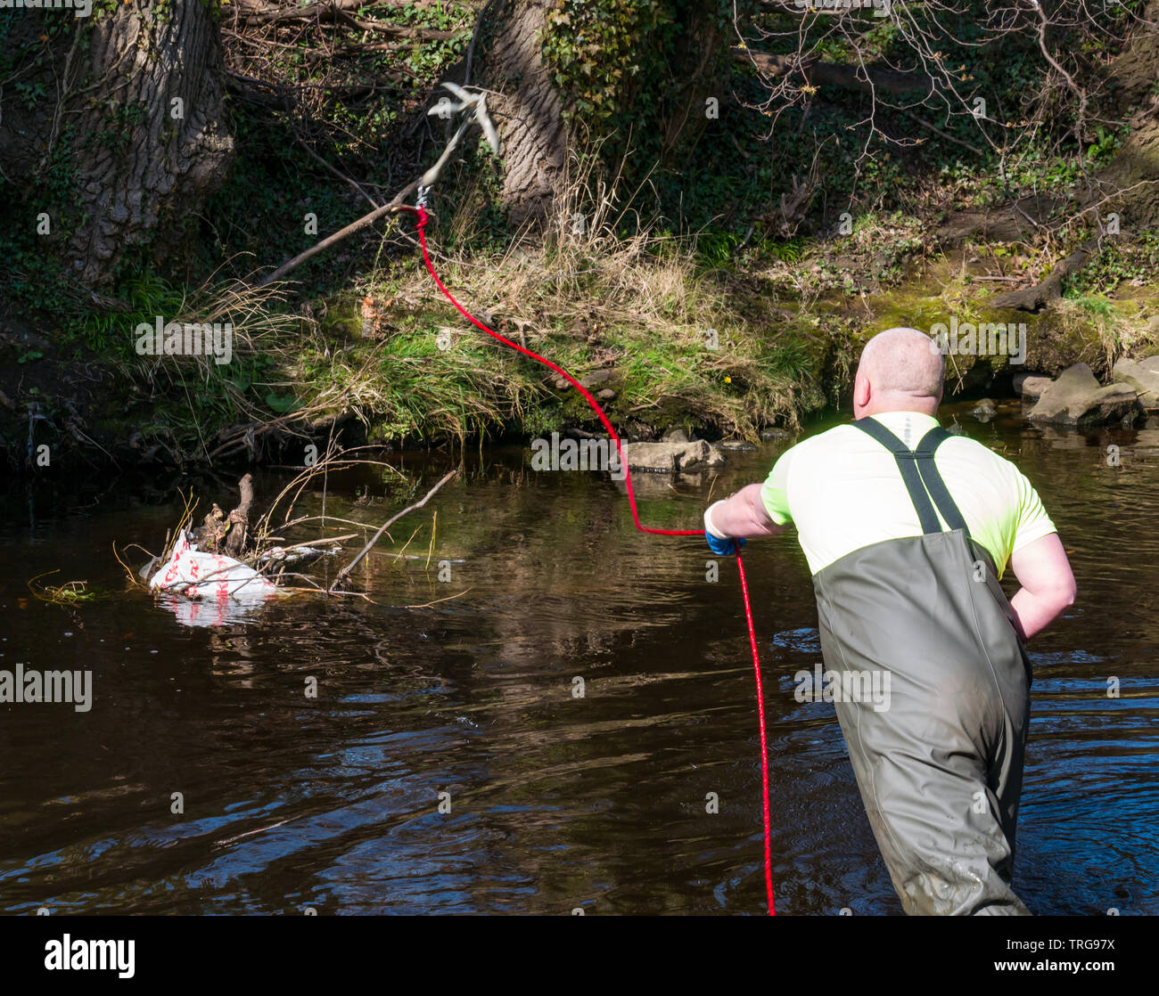 Man wearing waders hi-res stock photography and images - Alamy
