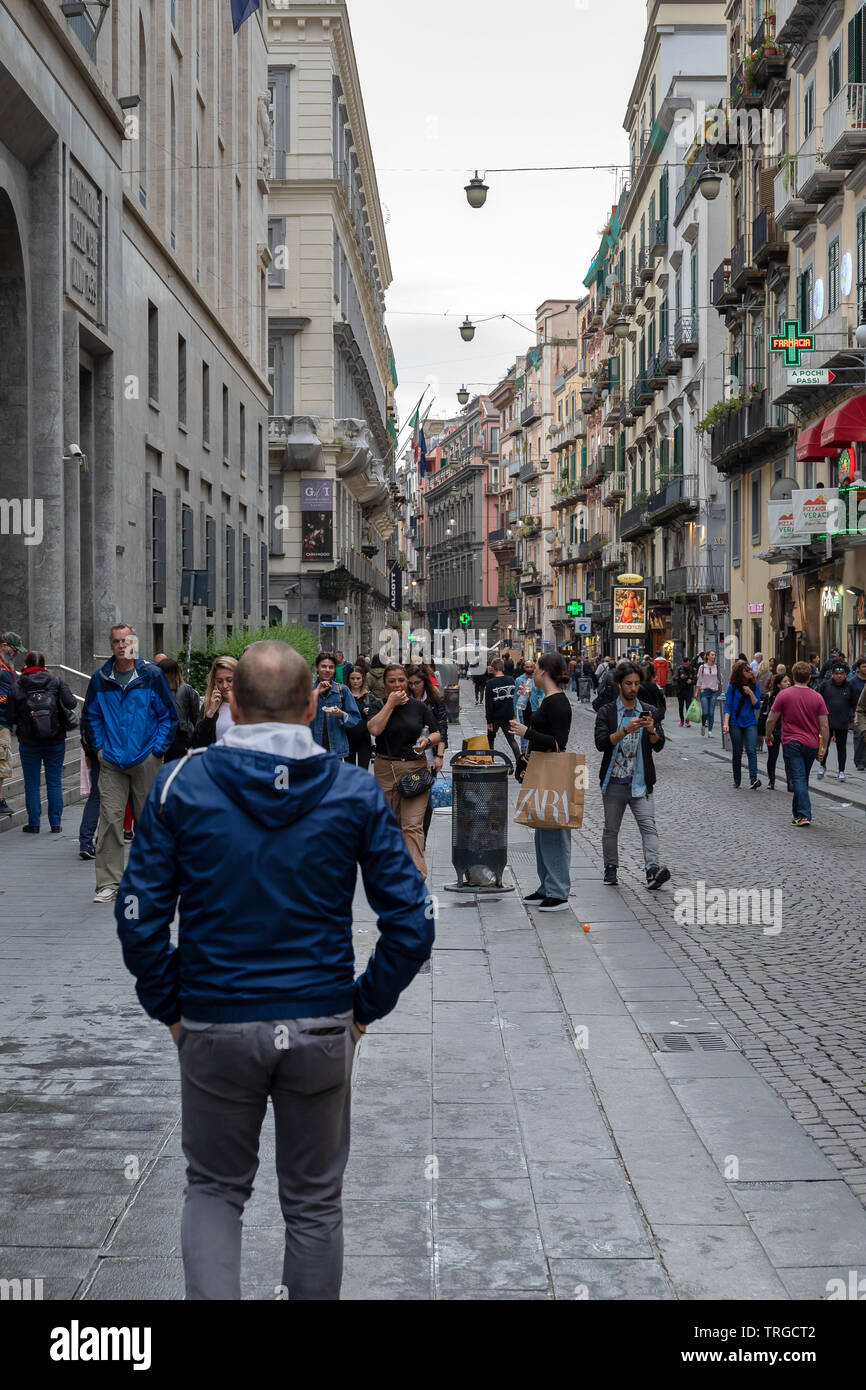 Woman walking street of facades hi-res stock photography and images - Alamy