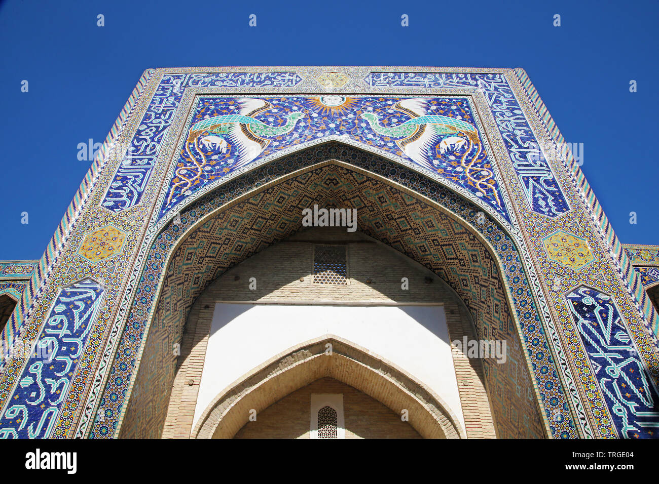 Impressive gate of a madrasa in Bukhara, Uzbekistan Stock Photo - Alamy