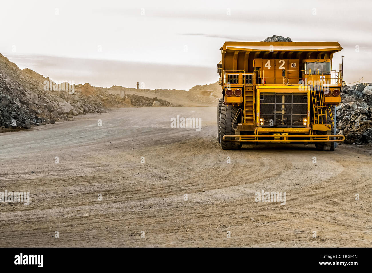 Dump Trucks transporting Platinum ore for processing Stock Photo - Alamy