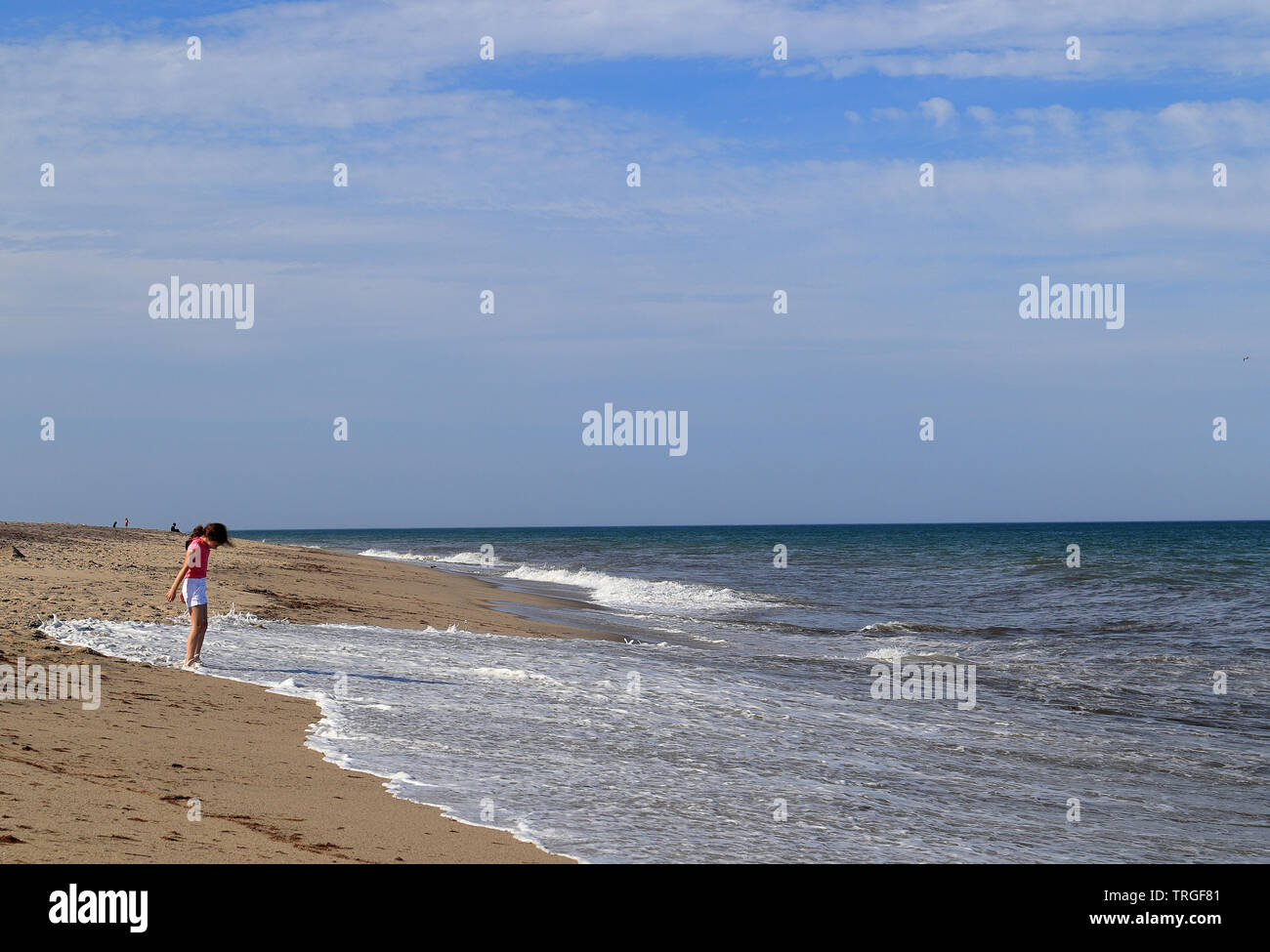 Nantucket, Massachusetts - May 26, 2019: Girl Looking at Sea Waves on ...