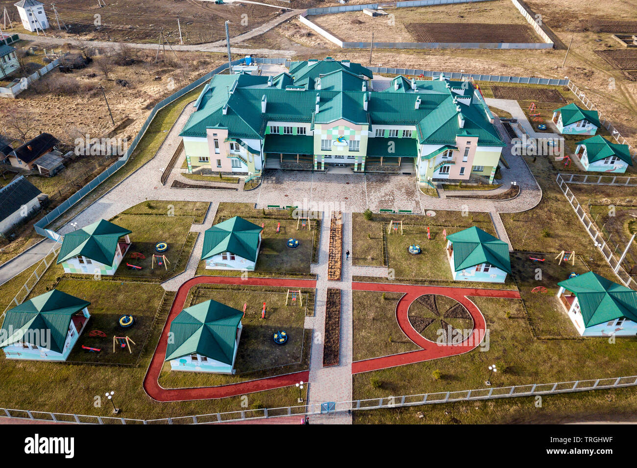 Aerial view of kindergarten or modern school complex, decorated ...