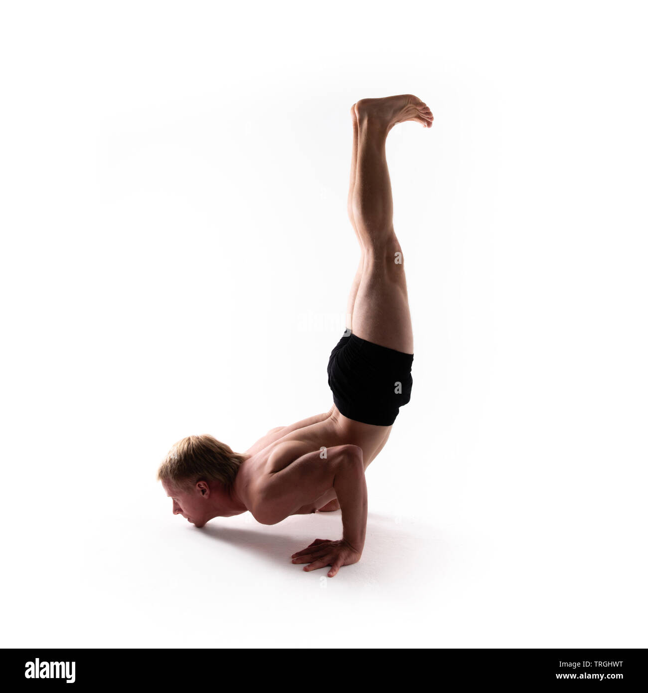 Yoga alphabet. The letter J formed by body of yogi Stock Photo - Alamy