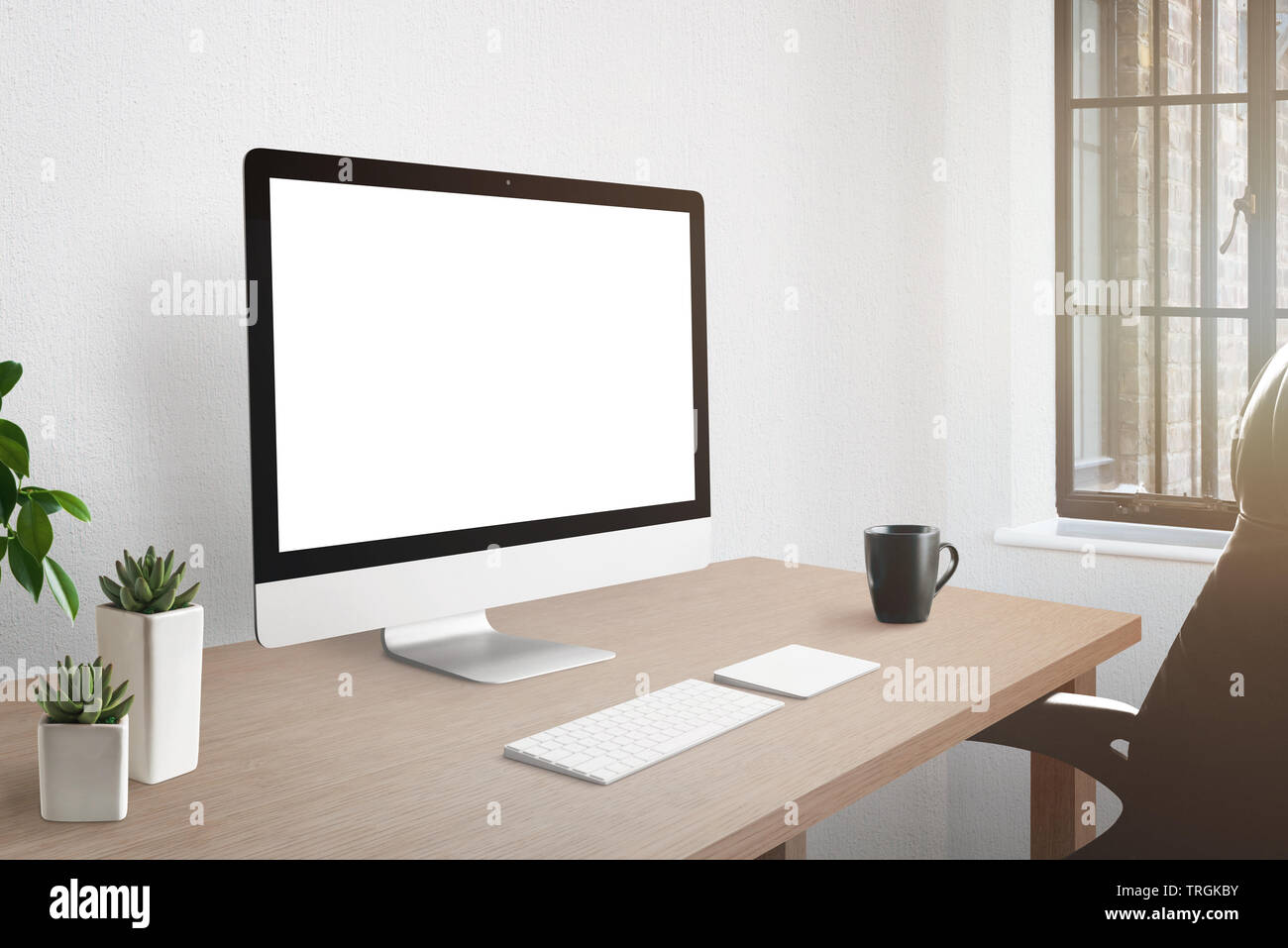 Workroom desk with computer display with isolated screen for mockup ...