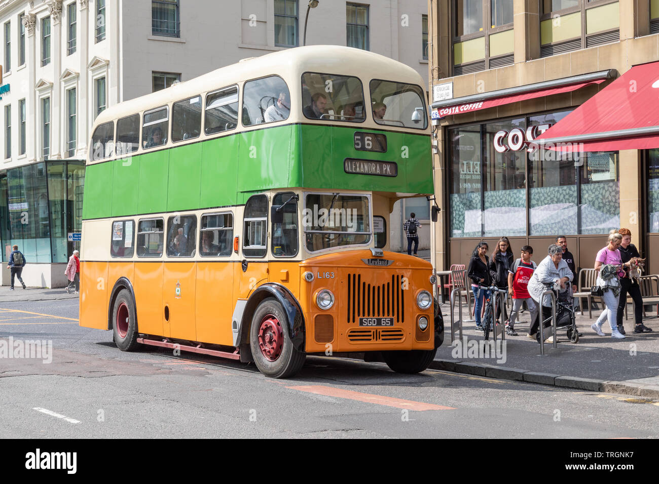 A vintage Leyland Titan PD2 double decker bus outside Costa Coffee at ...