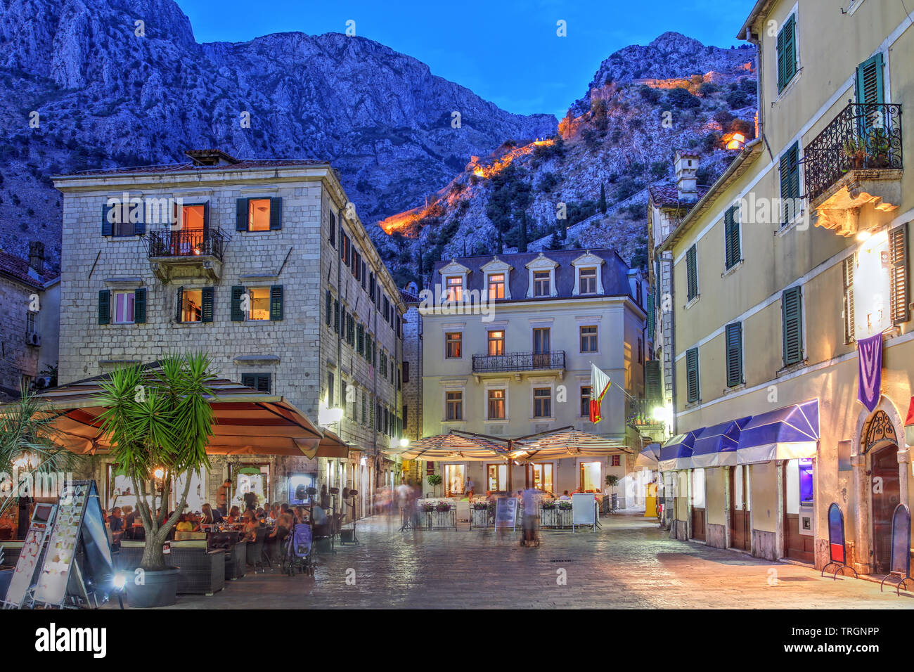 Scene in the medieval town of Kotor, Montenegro at twilight with the ...