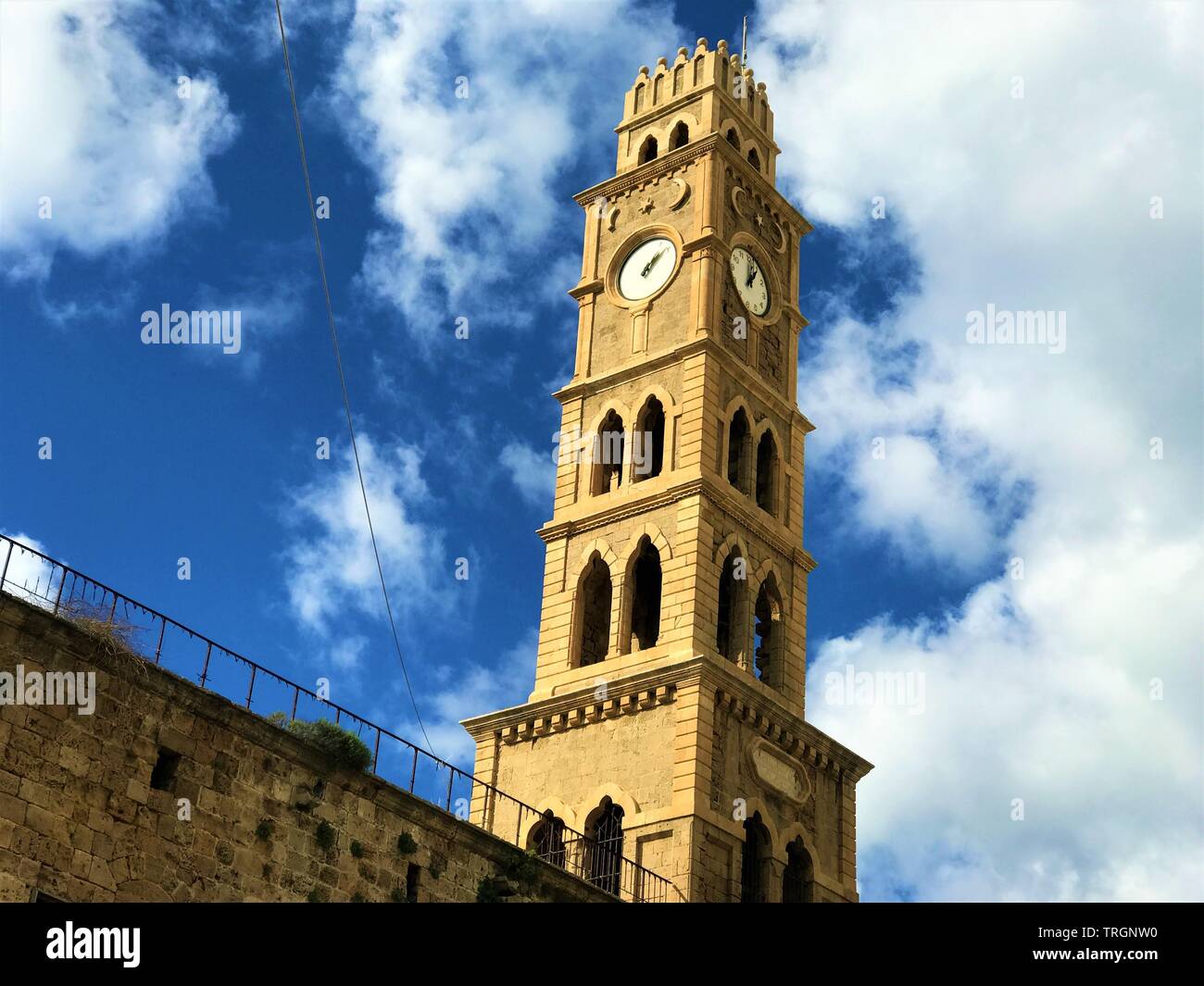 ancient clock tower in old city of Akko Israel Stock Photo - Alamy
