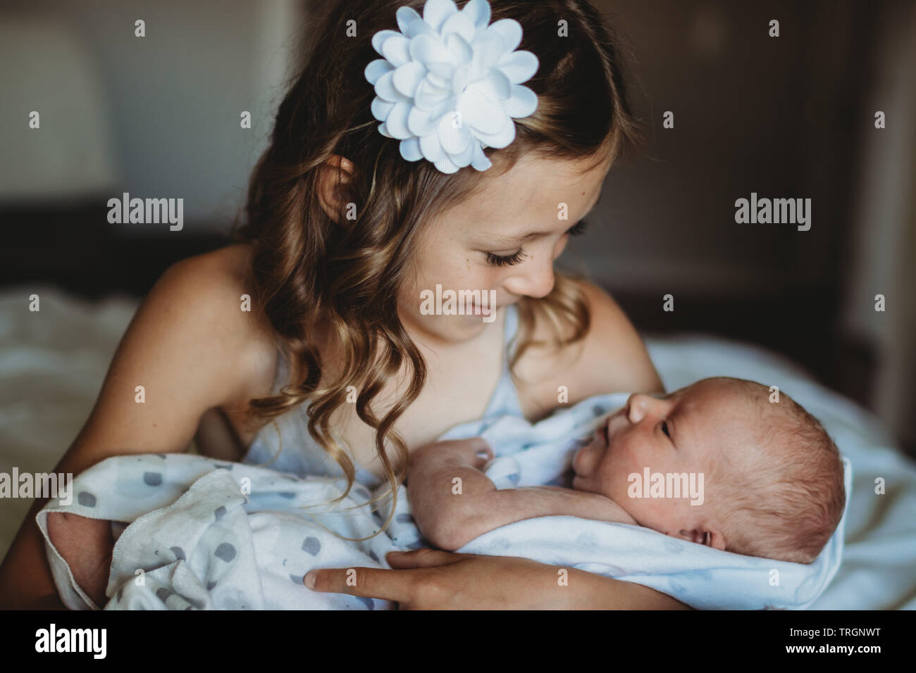 family at home with a new baby in the nursery Stock Photo - Alamy