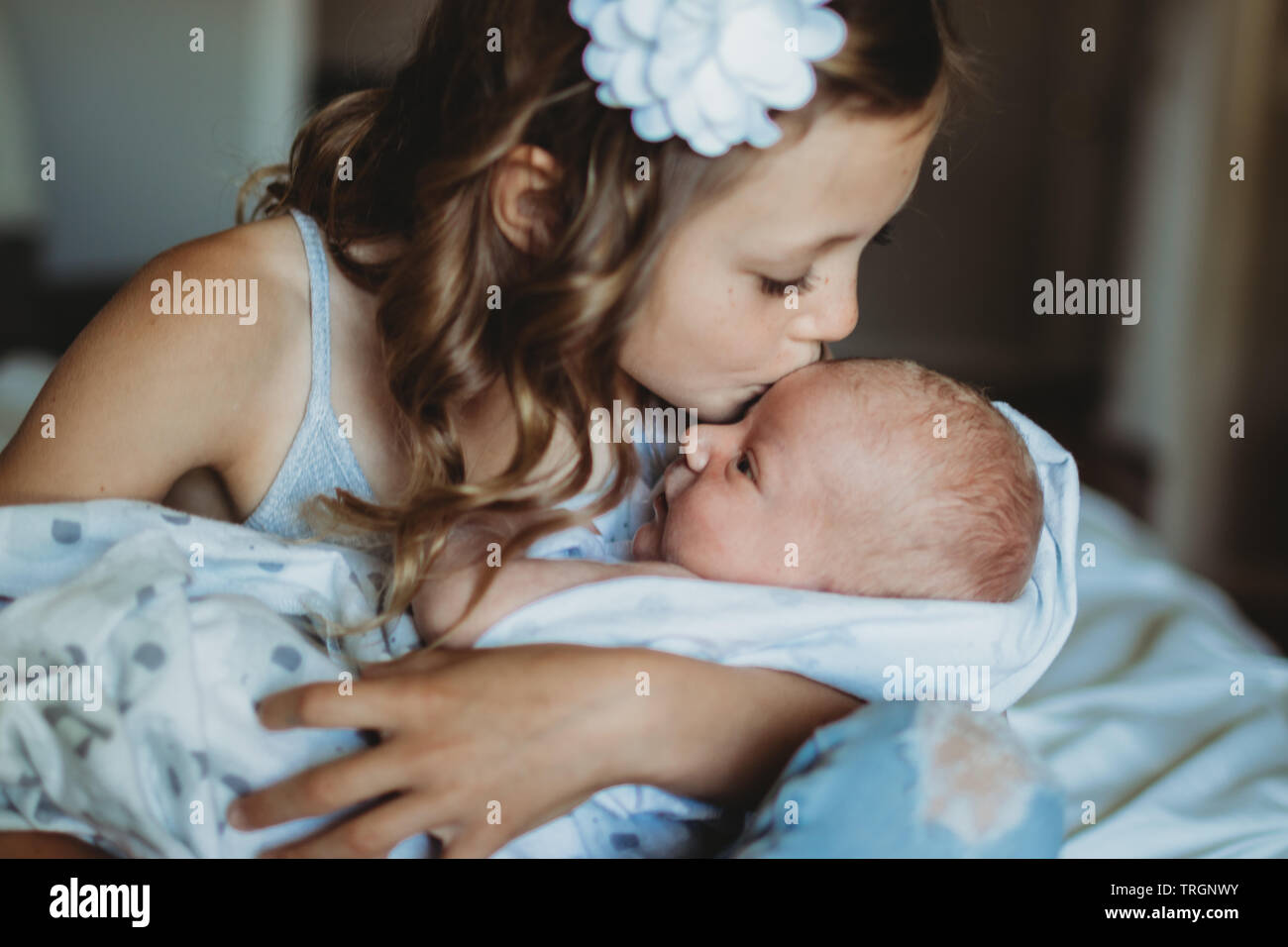 family at home with a new baby in the nursery Stock Photo - Alamy