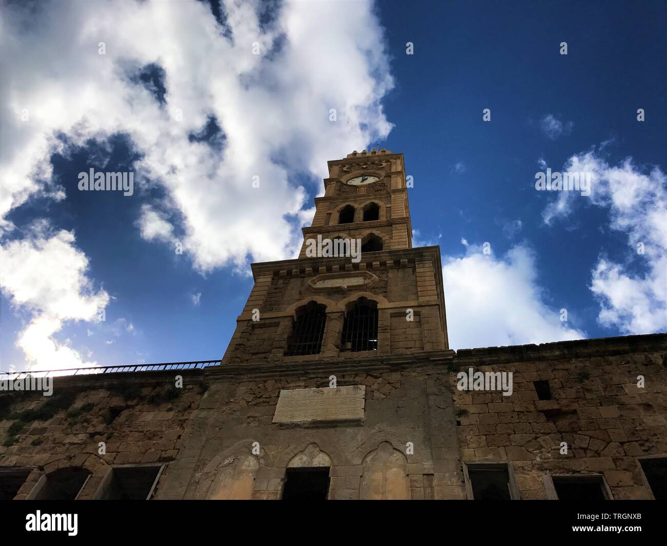 ancient clock tower in old city of Akko Israel Stock Photo - Alamy