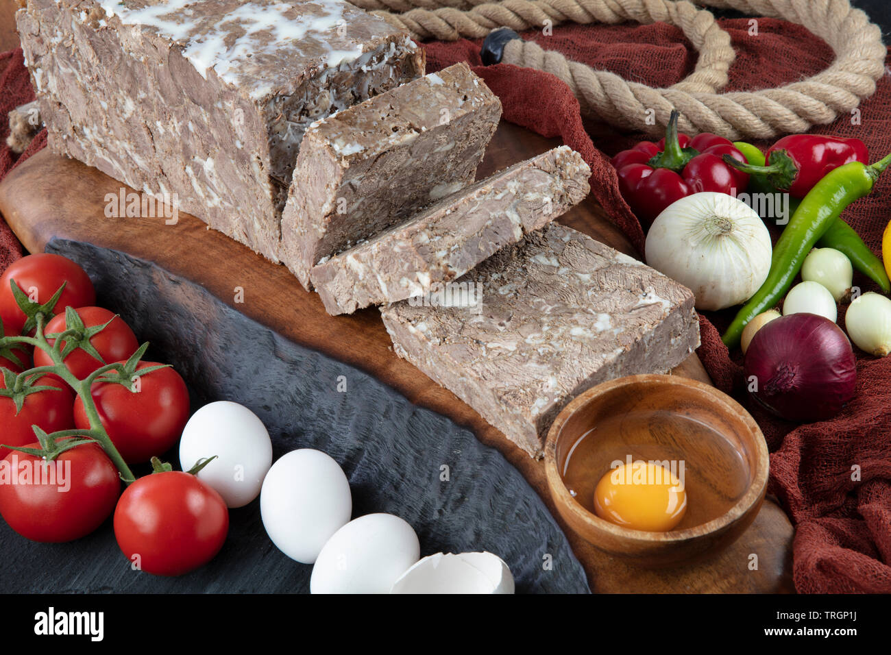 Turkish roasted meat ( kavurma ) on wooden table. Turkish cuisine; eggs ...