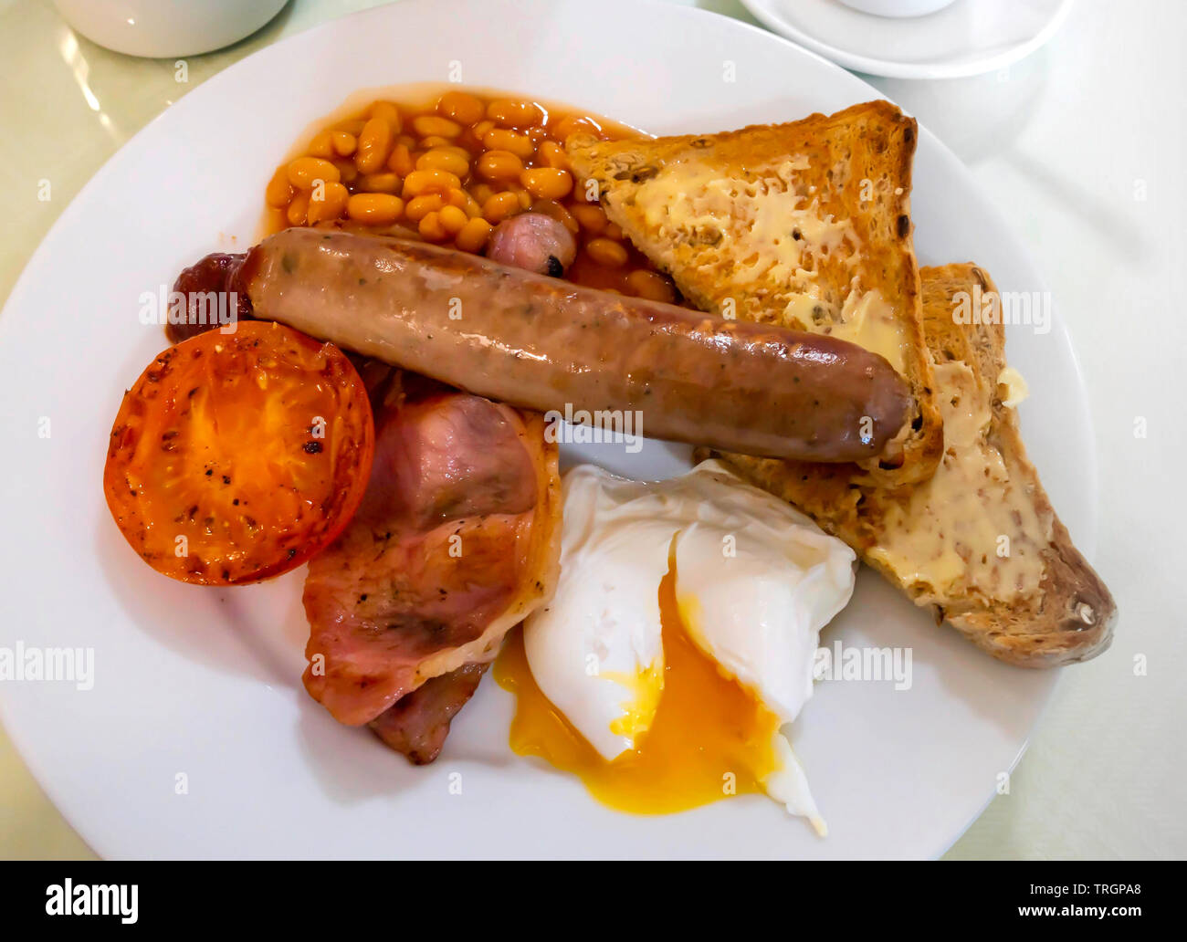 Small English Breakfast bacon poached egg sausage baked beans grilled ...