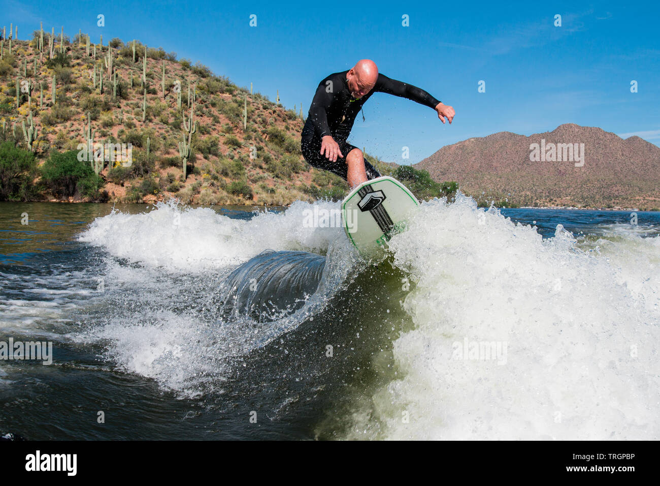 Wake surfers hi-res stock photography and images - Alamy