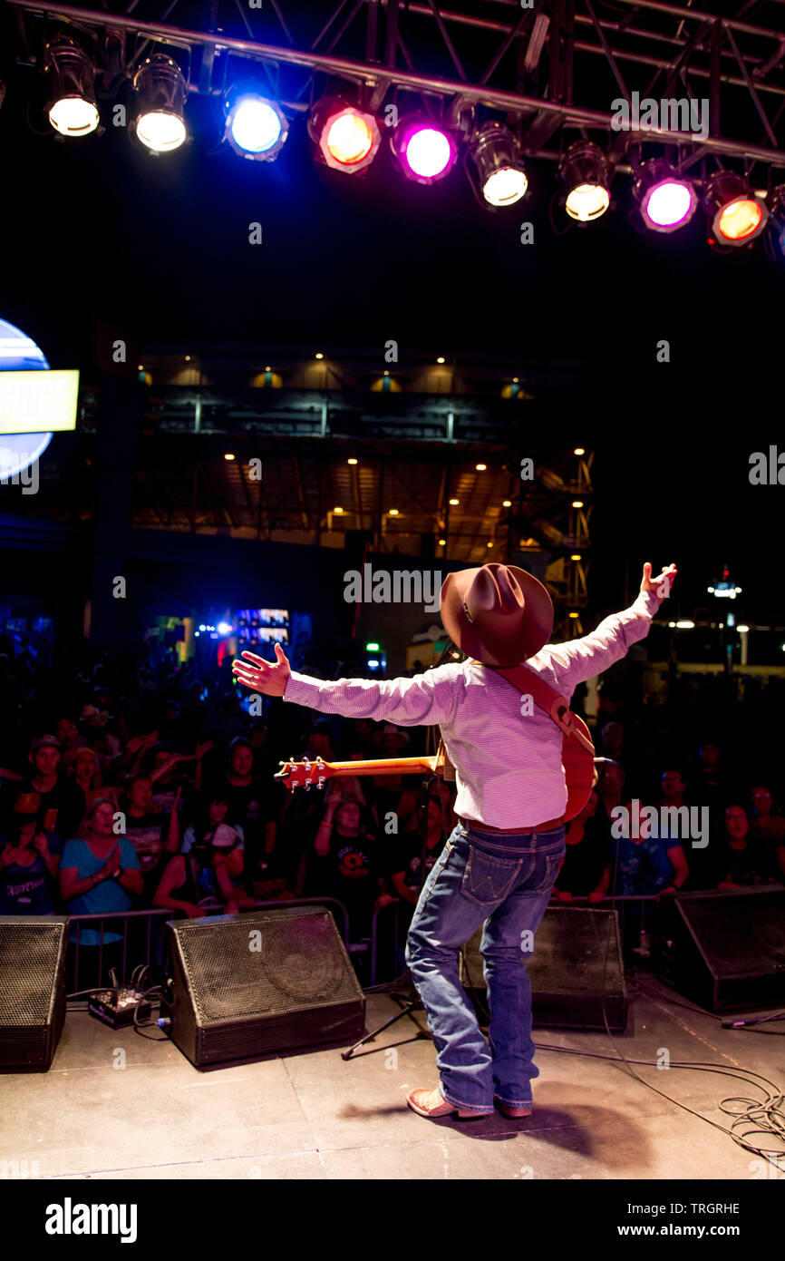 Country Musician Playing a live show on Stage Stock Photo - Alamy