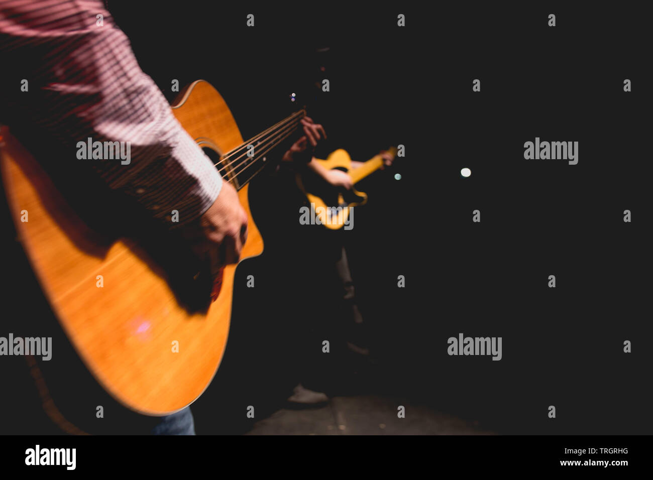 Country Musician Playing a live show on Stage Stock Photo - Alamy