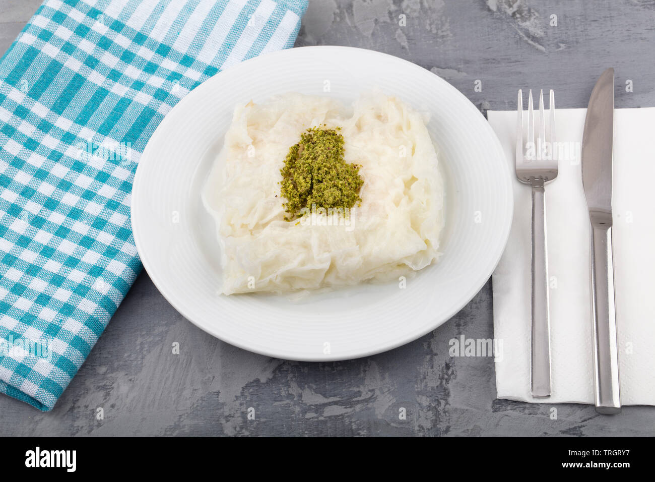 Turkish and Arabic Traditional Ramadan Dessert Gullac with grated ...