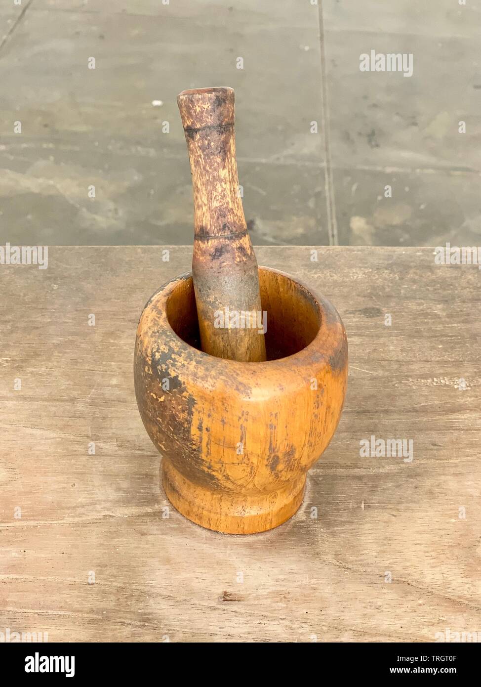 Traditional wooden mortar and pestle Stock Photo - Alamy
