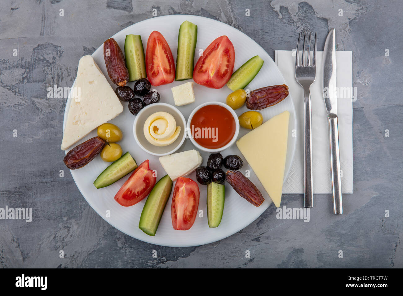 Traditional Ramadan (iftar) foods in ceramic plate.Three different ...